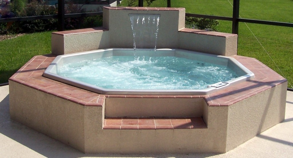 In-ground octagon with waterfall | Jacksonville Hot Tubs and Spas